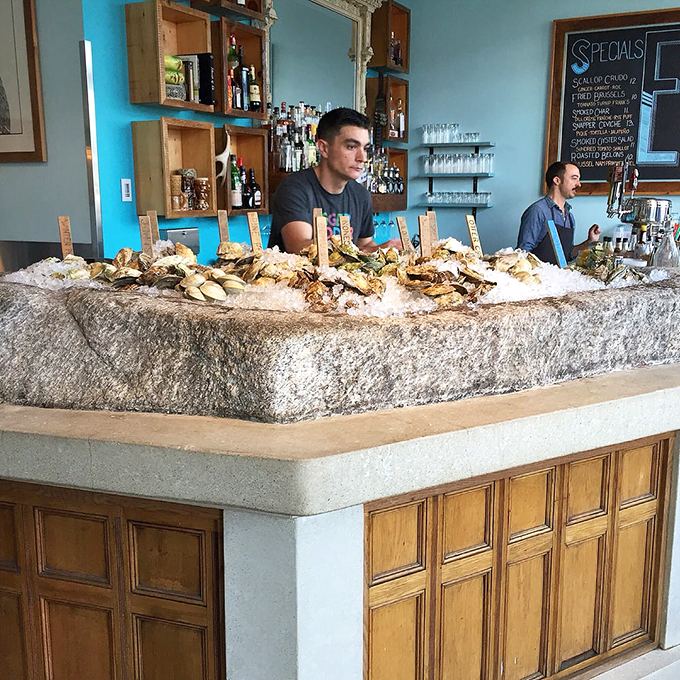 The oyster bar: where bivalves become the stars of the show. It's like a seafood runway, and every oyster is ready for its close-up.