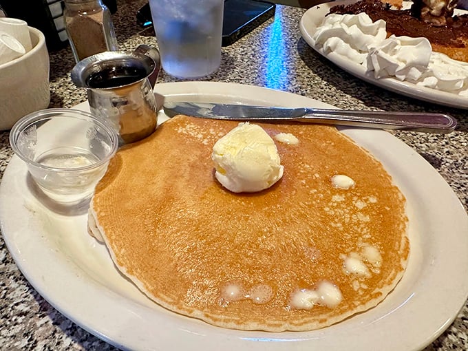 This pancake is living its best life with a crown of butter and a royal robe of syrup. Photo credit: Ron Rogers