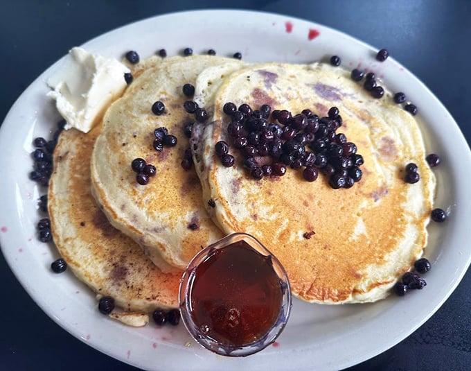 These pancakes are fluffier than a rom-com plot and studded with more blueberries than a summer's day in Maine. Pure breakfast bliss on a plate.