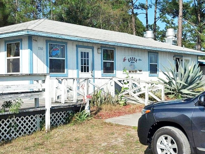 The weathered wooden porch and blue trim say "Old Florida" in the best possible way—no pretense, just good eating ahead.