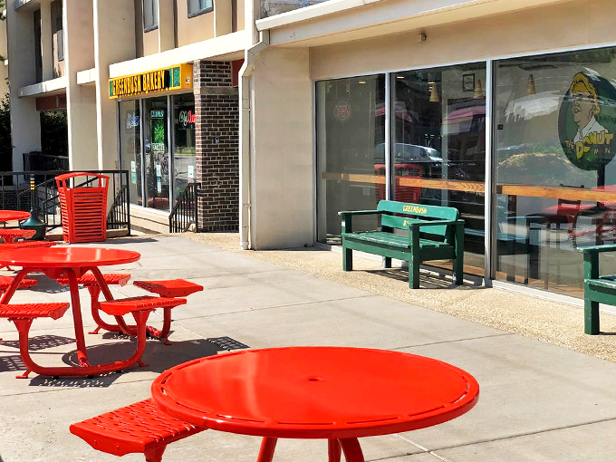 Alfresco donut dining! These cheerful tables are perfect for people-watching while you indulge in sugary bliss.