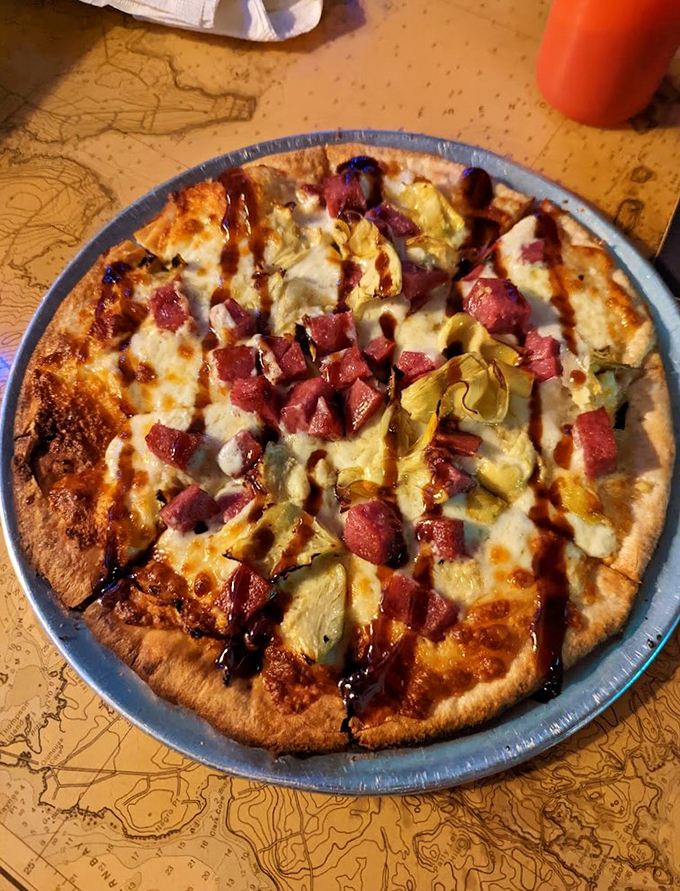 Another pizza masterpiece where ham and pineapple perform a tropical dance on a bed of melted cheese.