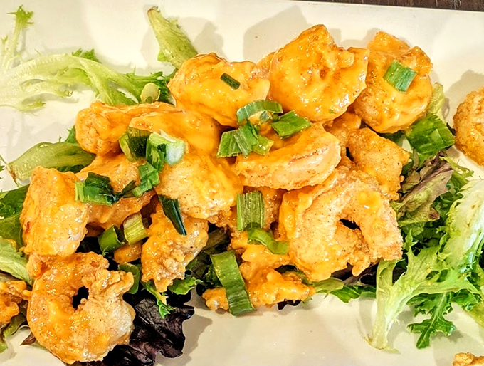 Who knew healthy could look this indulgent? These seasoned shrimp are doing their best to make salad the star of the show.