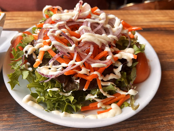 A garden-fresh salad dressed to impress, proving that even the supporting acts at Testa's deserve a standing ovation.