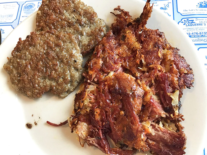 Meat lovers, rejoice! This plate is bringing home the bacon... and the sausage... and the corned beef.