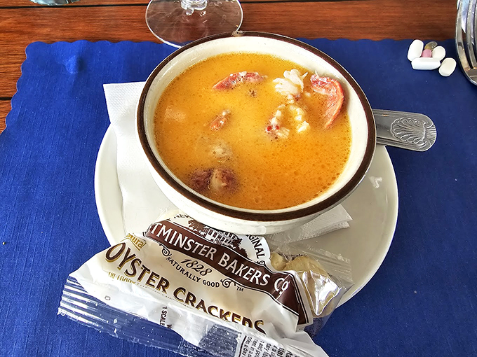 A bowl of liquid gold that's more treasure than soup, with tender morsels of seafood playing hide and seek.