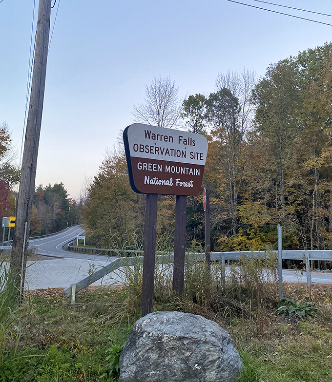 The sign says "Warren Falls," but it might as well say "Paradise This Way." Your GPS to natural wonder awaits!