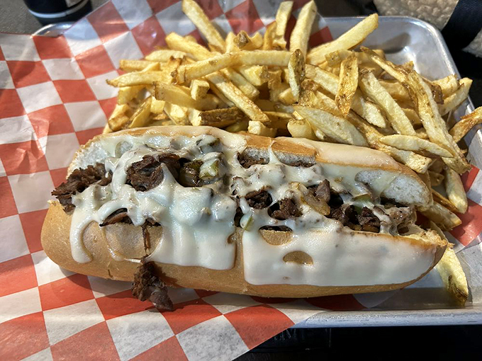 This isn't just a sub, it's a masterpiece of melted cheese and tender steak that demands to be devoured.