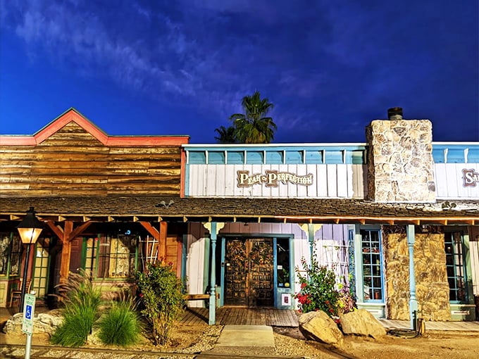 Peak Perfection's storefront captures the essence of frontier architecture, with its weathered wood and desert-adapted landscaping.