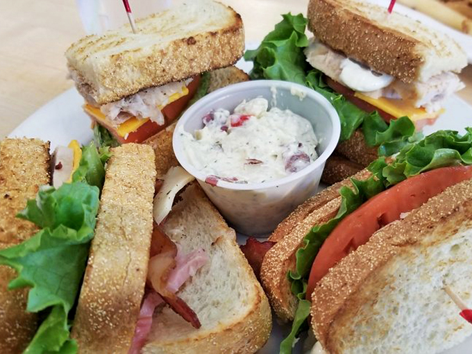 The club sandwich: a skyscraper of flavor in a world of food bungalows. It's like a BLT that went to finishing school and came back with a fancy degree.