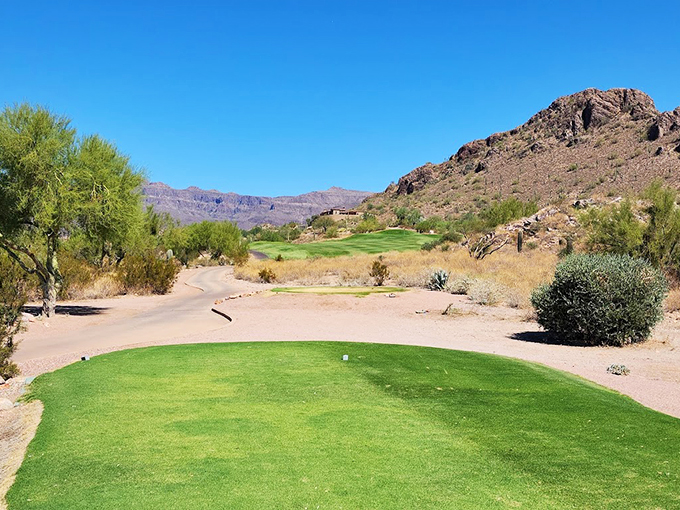 A hole with a view! Tee off into a panorama of desert beauty, where every stroke is accompanied by nature's grand spectacle.