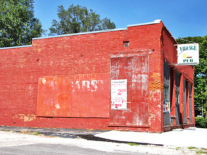 Behind that weathered red brick facade lies the heart of local social life - the Village Pub.