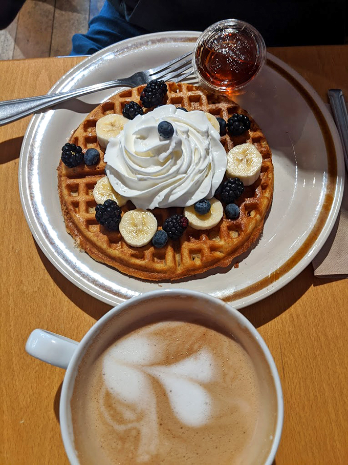 A waffle that's dressed to impress, topped with fresh berries and cream that would make your grandmother proud.