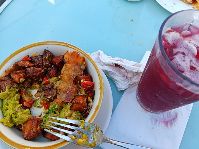 A hearty bowl of breakfast potatoes and avocado that proves morning meals deserve more than just cereal.