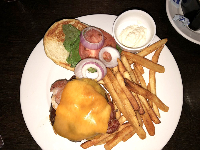 This burger's stacked higher than a leprechaun on stilts. It's a tower of power that'll have you seeing green with envy. Photo credit: Julianne W.
