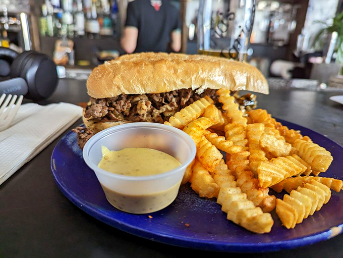 Burger bliss achieved! This sandwich and its crispy sidekick are ready to rock your world and challenge your belt's resolve.