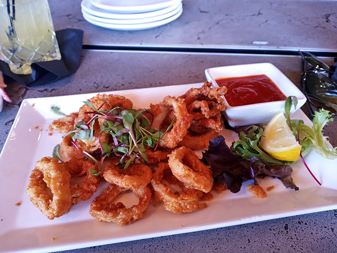 Calamari that's a cut above! These crispy rings aren't just appetizers; they're edible jewelry for your taste buds. Photo credit: David Walton
