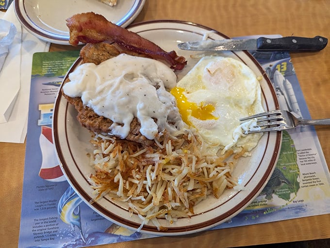Southern comfort on a plate! This country-fried steak, smothered in gravy, is like a warm, crispy hug for your stomach. Photo credit: Jose Ruiz