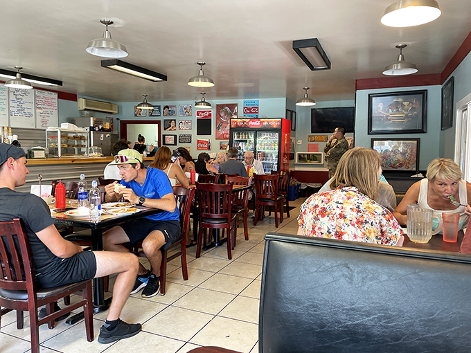 Happy diners in their natural habitat. Notice the intense focus as they perform the sacred ritual of "cleaning the plate."