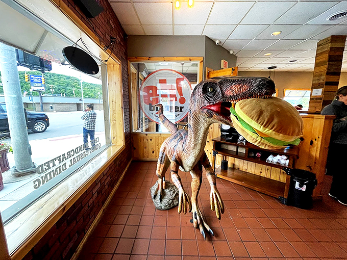 Clever girl! This dino knows the secret to survival&mdash;a big, juicy Eh! Burger. Extinction? Not with these flavors around!