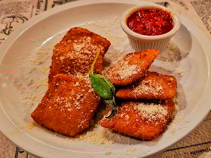 Fried ravioli: Where crispy meets creamy in a dance of deliciousness. It's like pasta decided to dress up for a night out. Photo credit: Carlos Alberto Retired Military