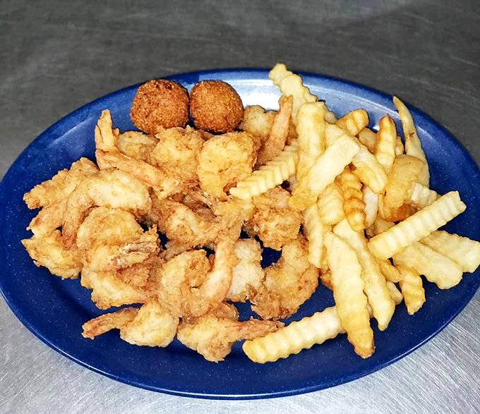 Fried seafood extravaganza! It's like someone took the best parts of the ocean and gave them a crispy, golden makeover. Photo credit: Fannin's Family Restaurant
