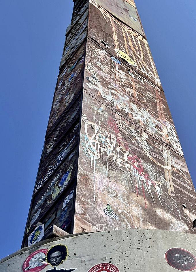 Up close, the cabinet reveals its weathered charm. Each scratch and scribble tells a story - if only these drawers could talk!