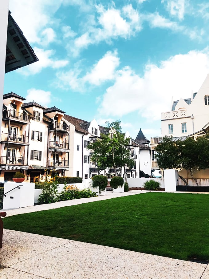 Manicured lawns and pristine architecture create peaceful spaces where Southern hospitality meets coastal sophistication.