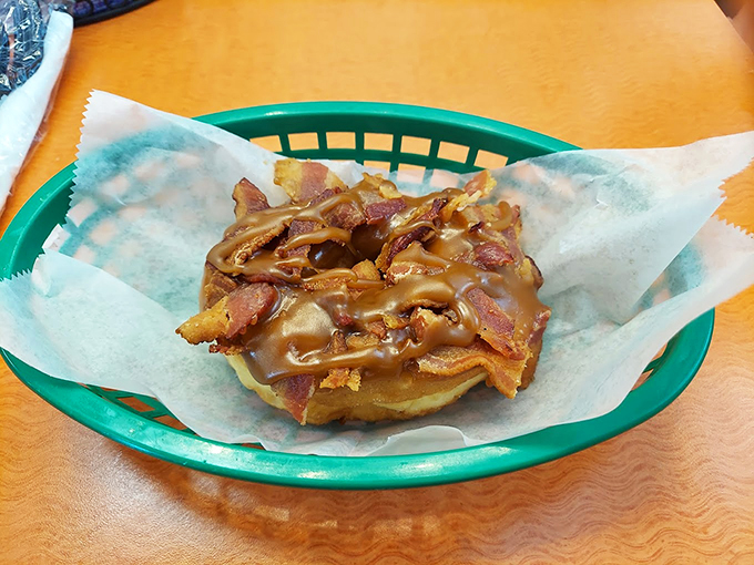 The maple bacon donut: where sweet meets savory in a union so perfect, it should have its own romantic comedy. It's breakfast and dessert holding hands.