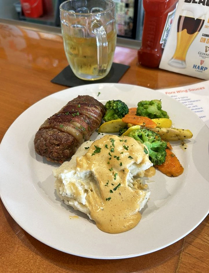 This ain't your grandma's meatloaf. It's a flavor bomb wrapped in bacon, ready to blow your mind and expand your waistline.