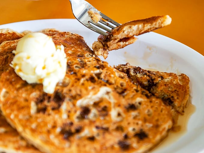 Pancakes so fluffy, they could float away if not anchored by that melting pat of butter. Maple syrup, standing by for takeoff!