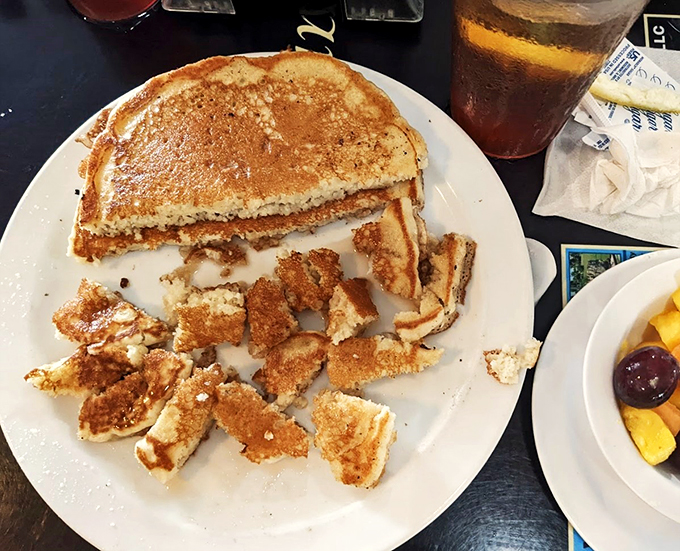 Golden-brown, fluffy pancakes with a side of fresh fruit &ndash; sometimes happiness really is this simple.