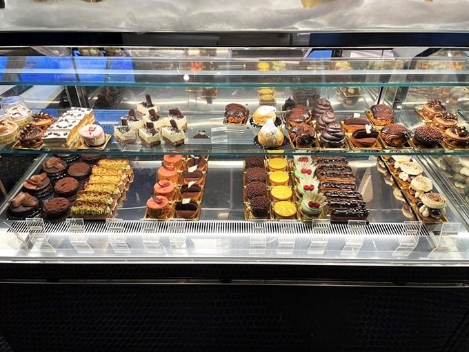 Dessert heaven or edible art museum? Either way, this pastry case is a sweet tooth's dream come true. Resistance is futile!
