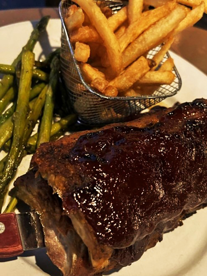 These ribs gleam with such a perfect glaze, they could make a vegetarian question their life choices.