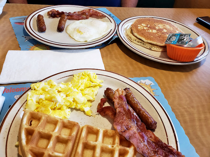 Waffles: because sometimes pancakes need to step up their game. Golden, crispy, and ready for their syrupy close-up, these beauties are the breakfast of champions. Photo credit: Pam Schaefer