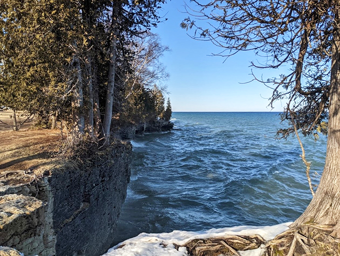 Lake Michigan's secret sculptor studio. These wave-carved cliffs are proof that patience and persistence create true masterpieces.