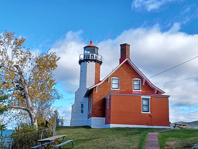 Perched on Lake Superior's rocky shore, Eagle Harbor Lighthouse stands ready for its maritime close-up. Lights, camera, navigation!