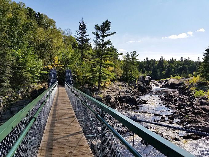 Nature's rollercoaster! Rugged terrain and a swinging bridge combine for an adventure that'll make your heart race and your camera click. Photo credit: Doug Eltoft