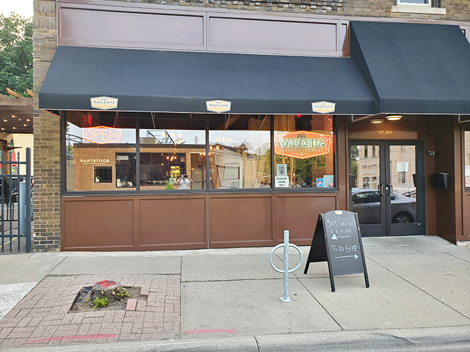 Wabasha's welcoming storefront. Step inside for a pint of pure Minnesota nice &ndash; it's like a hug for your taste buds.