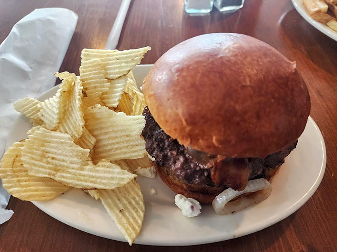 Burger bliss achieved! This hefty handful proves that Helen's isn't just about seafood - they're masters of the turf as well as the surf.