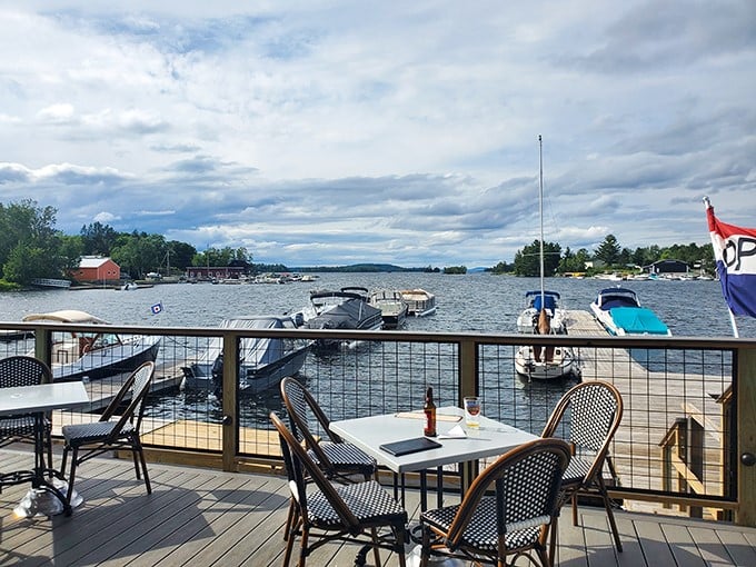 Dinner with a side of scenery! This lakeside spot serves up panoramic views that'll have you wondering if you've stumbled into a Bob Ross painting.