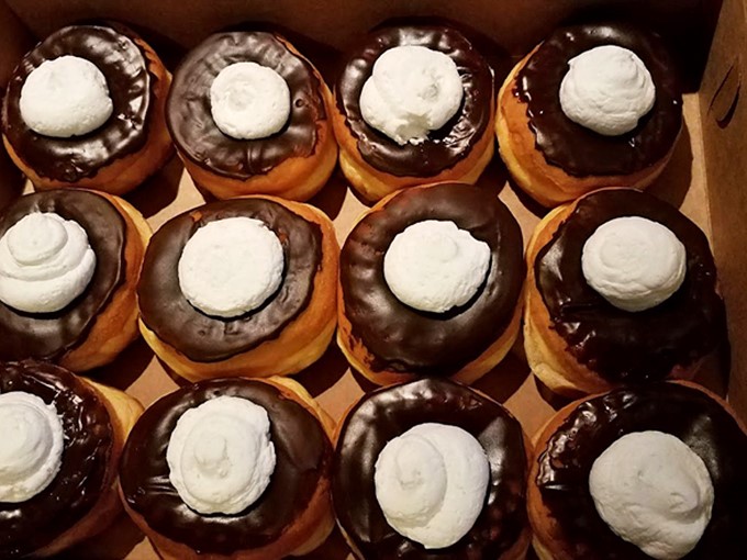 Chocolate-topped donuts with a dollop of cream &ndash; because sometimes you need a hug for your mouth.
