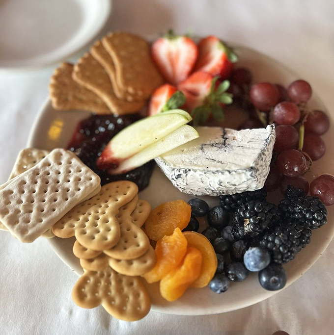 A cheese plate that's a work of art. It's like a delicious treasure map, and X marks the spot for every cheese lover's dream.
