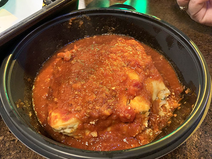 Layers of cheesy, saucy goodness! This lasagna looks like it could solve world peace, one hearty bite at a time.