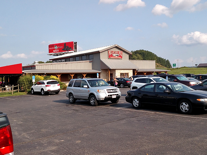 Park it right here for flavor town! This lot isn't just full of cars, it's full of soon-to-be-satisfied BBQ enthusiasts.