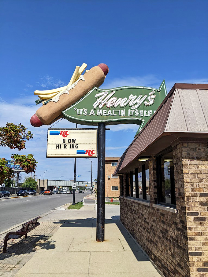 Henry's sign: where neon dreams and hot dog reality collide. It's not just a meal, it's an adventure!