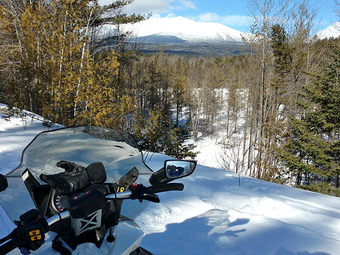 Winter wonderland meets extreme sports: Where snowmobilers carve their own icy highways. Santa's sleigh has nothing on these bad boys!