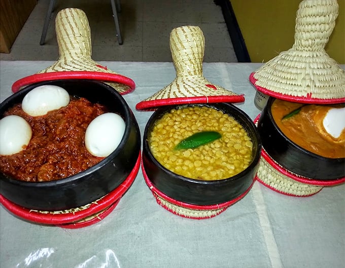 Three little pots of pure joy: spiced stews and legumes under traditional basket covers. It's like opening presents at dinnertime!