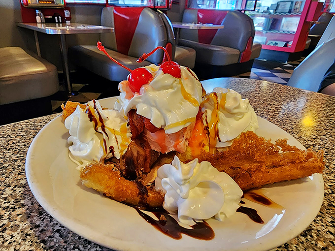 A banana split that Elvis himself would approve of &ndash; golden-fried bananas crowned with ice cream and whipped cream glory. Photo credit: Leena Marie
