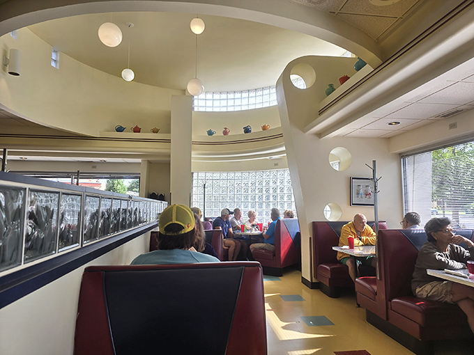 Cozy booths and charming decor &ndash; it's like sitting in your grandma's kitchen, if grandma had seriously cool taste in light fixtures.